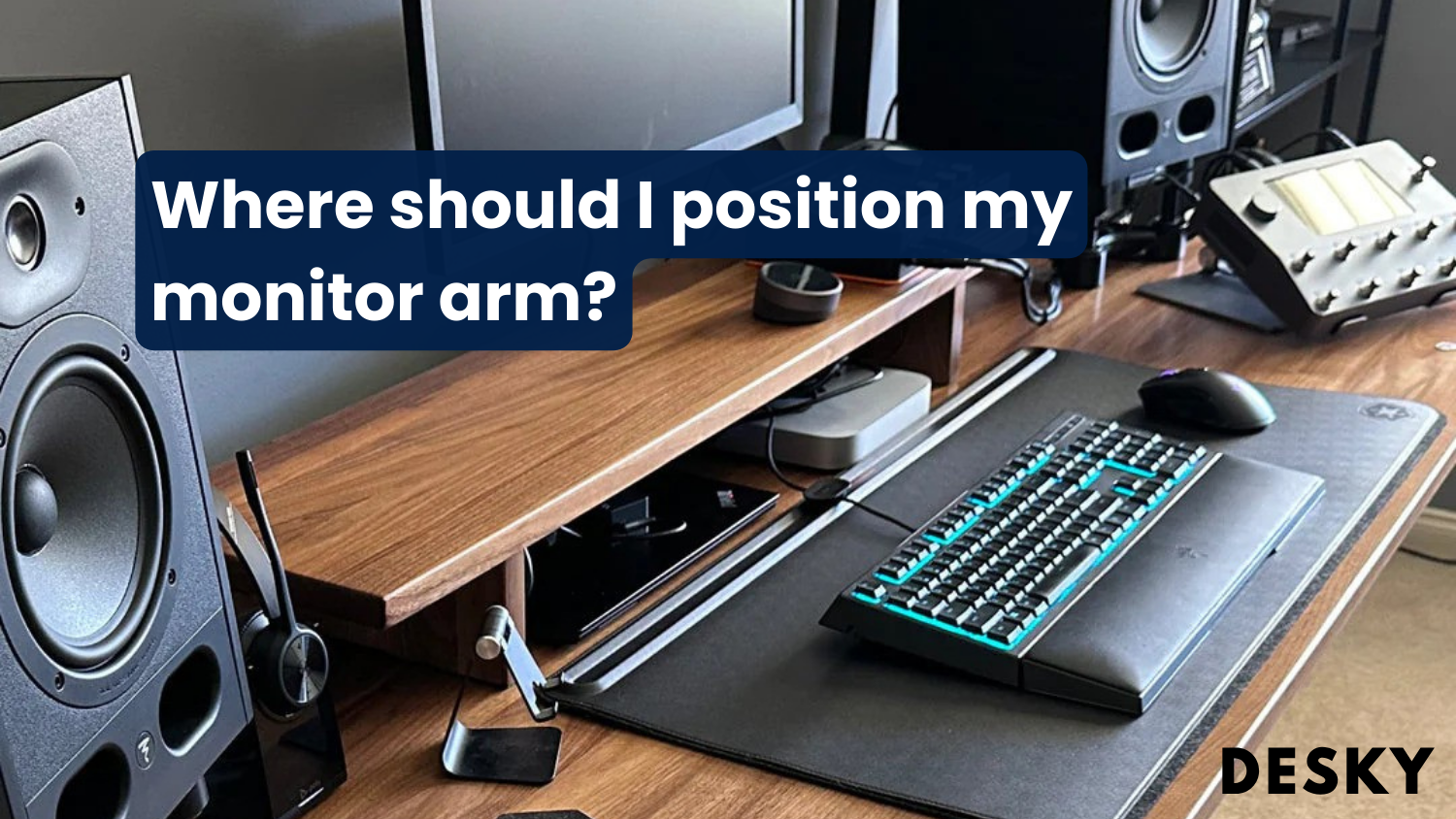 Where should I position my monitor arm?